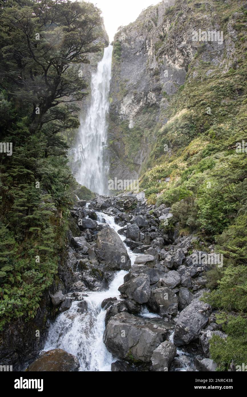 The Devils punchbowl falls near Arthurs pass village. A tall easily ...