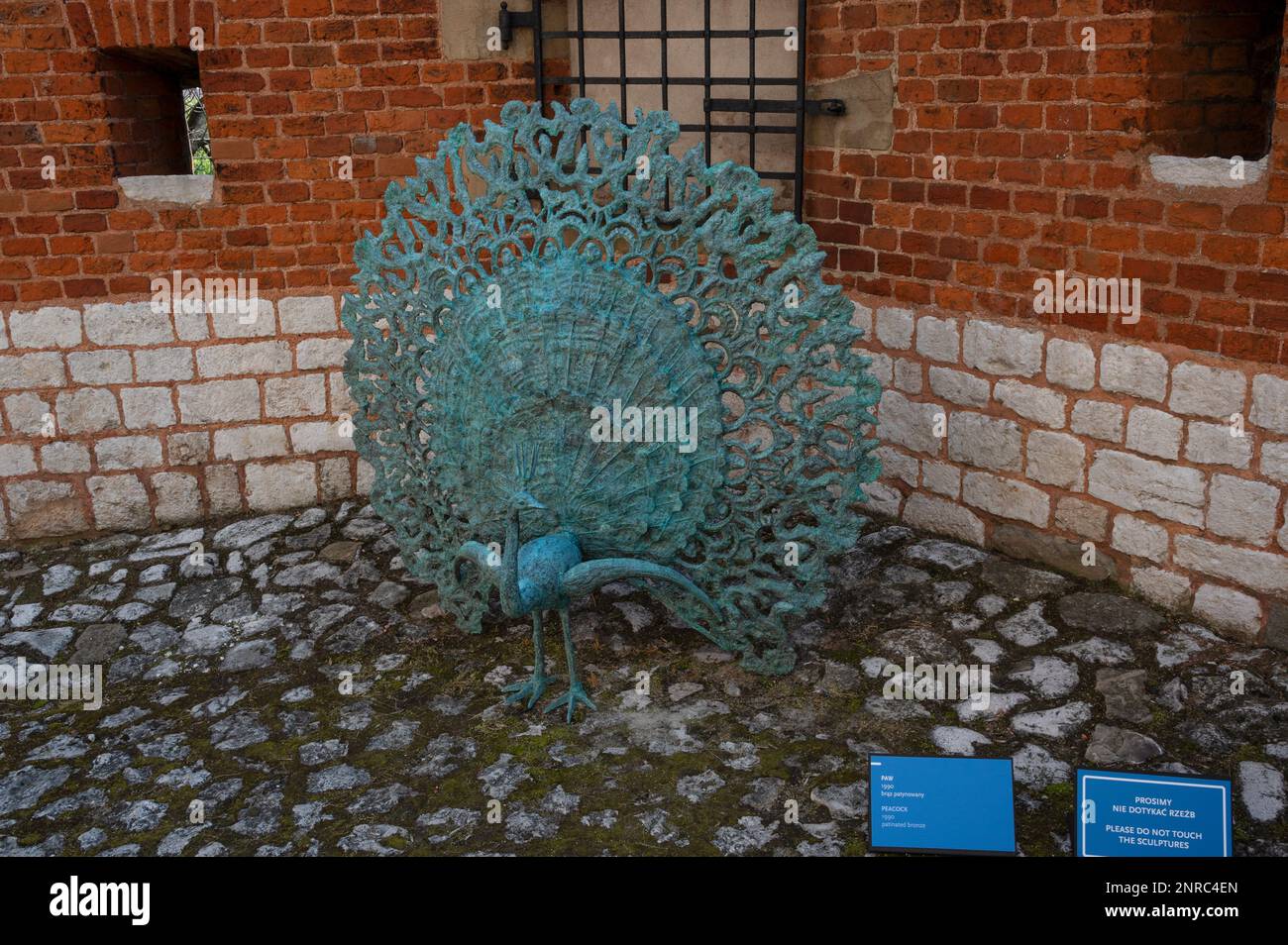 View of the patinated bronze statues at the Wawel Royal castle,Krakow ...
