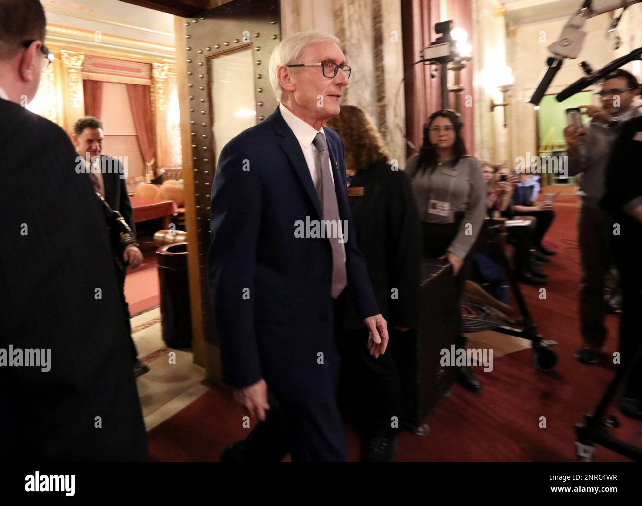 Wisconsin Gov. Tony Evers enters the Assembly Chambers to deliver his ...
