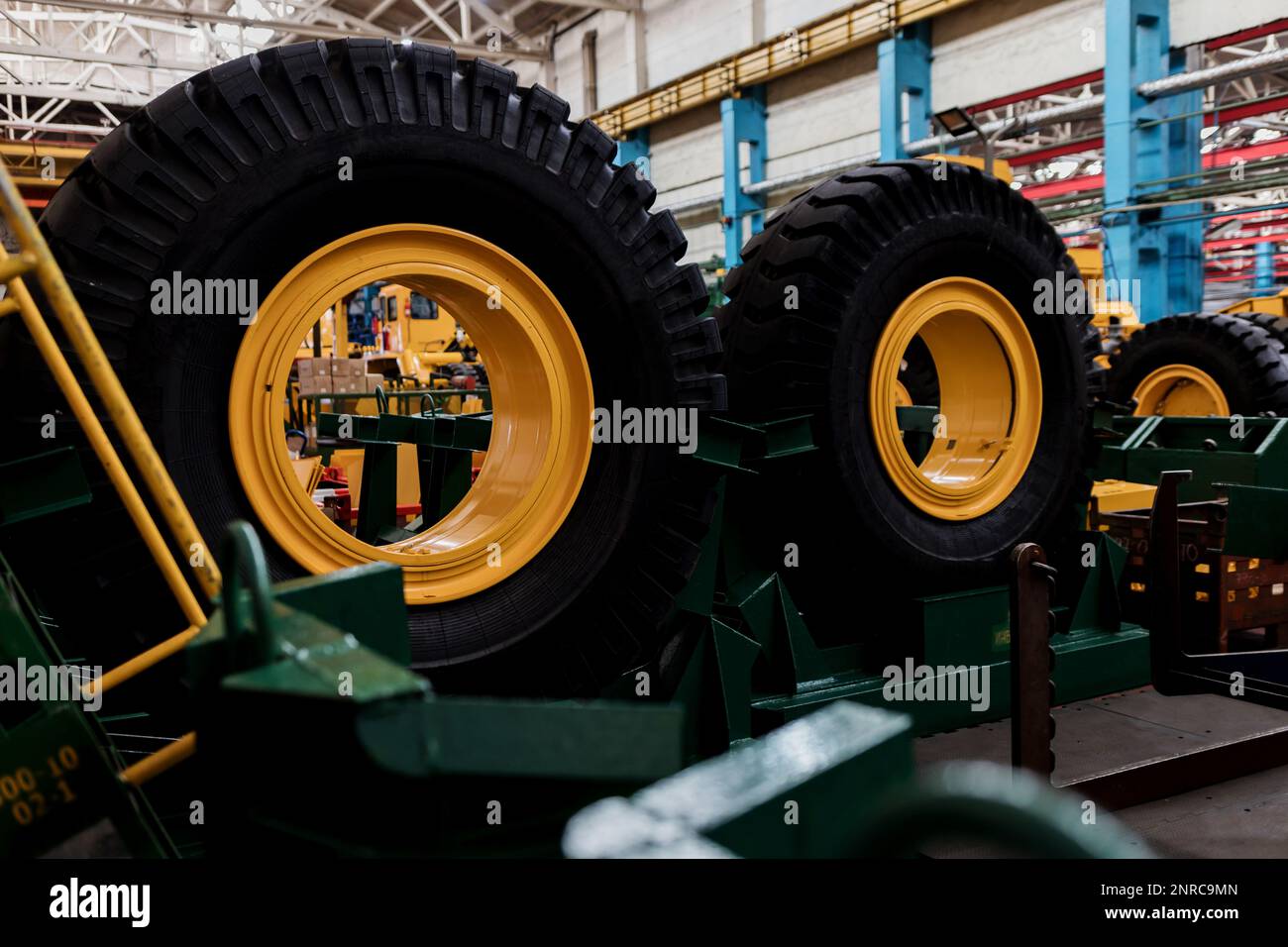 Giant size wheels and tires on factory. large rubber wheels of ...