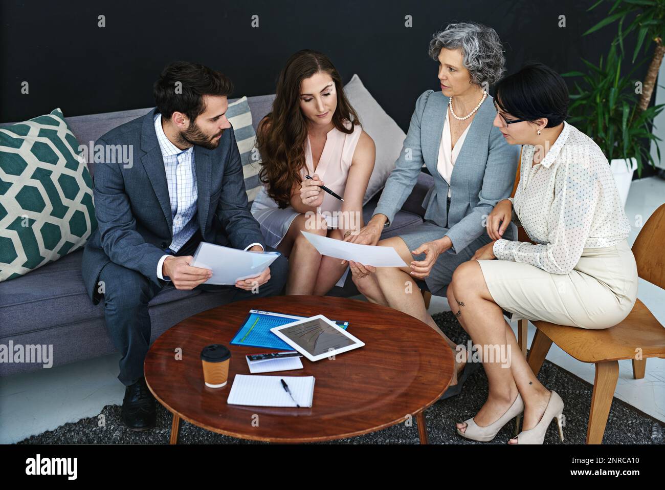 Focused on achieving only the best together. businesspeople having a ...