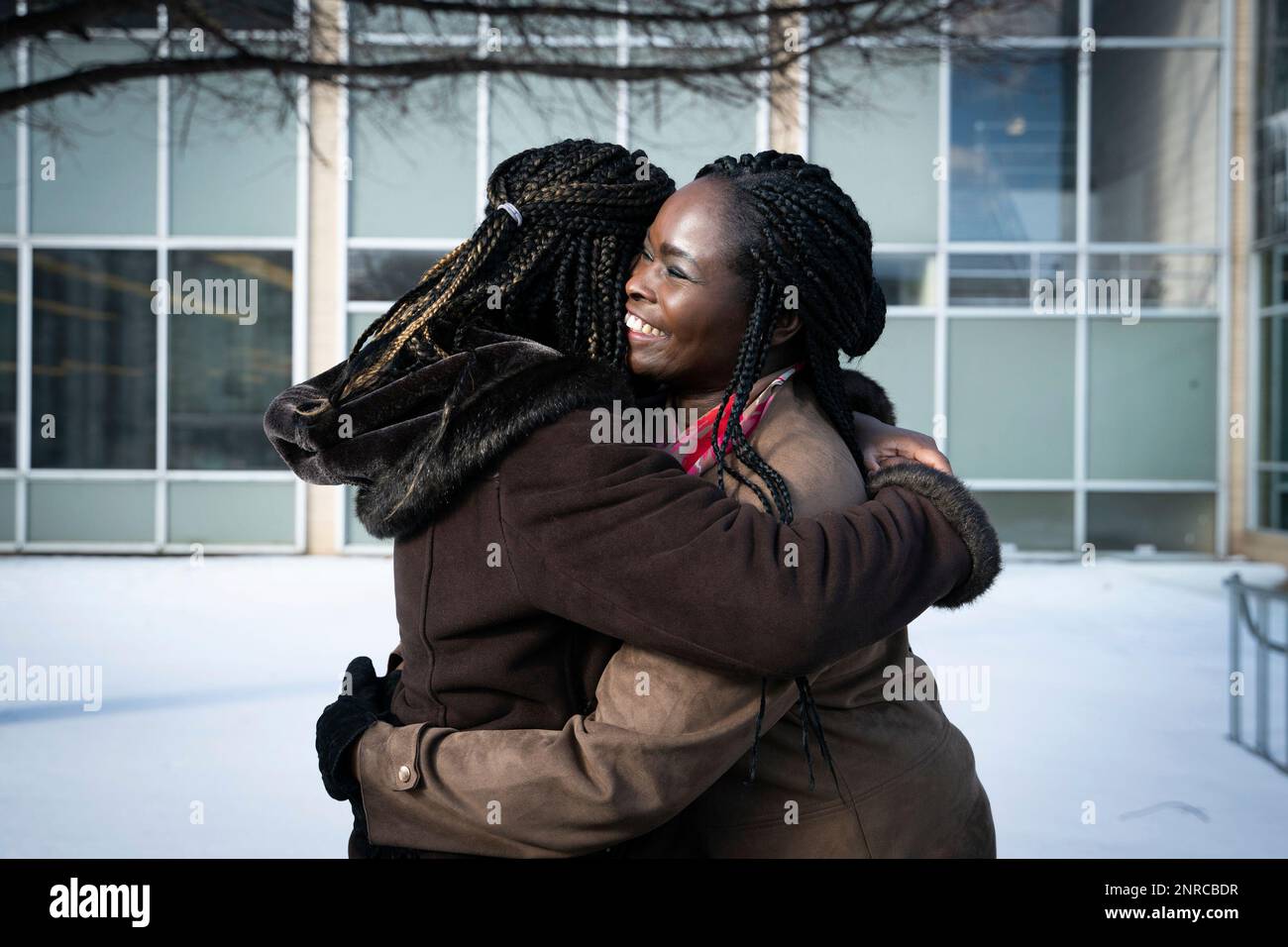 Tera Clemons, 18, left, hugs her mother Carrie Edwards-Clemons, 52 ...