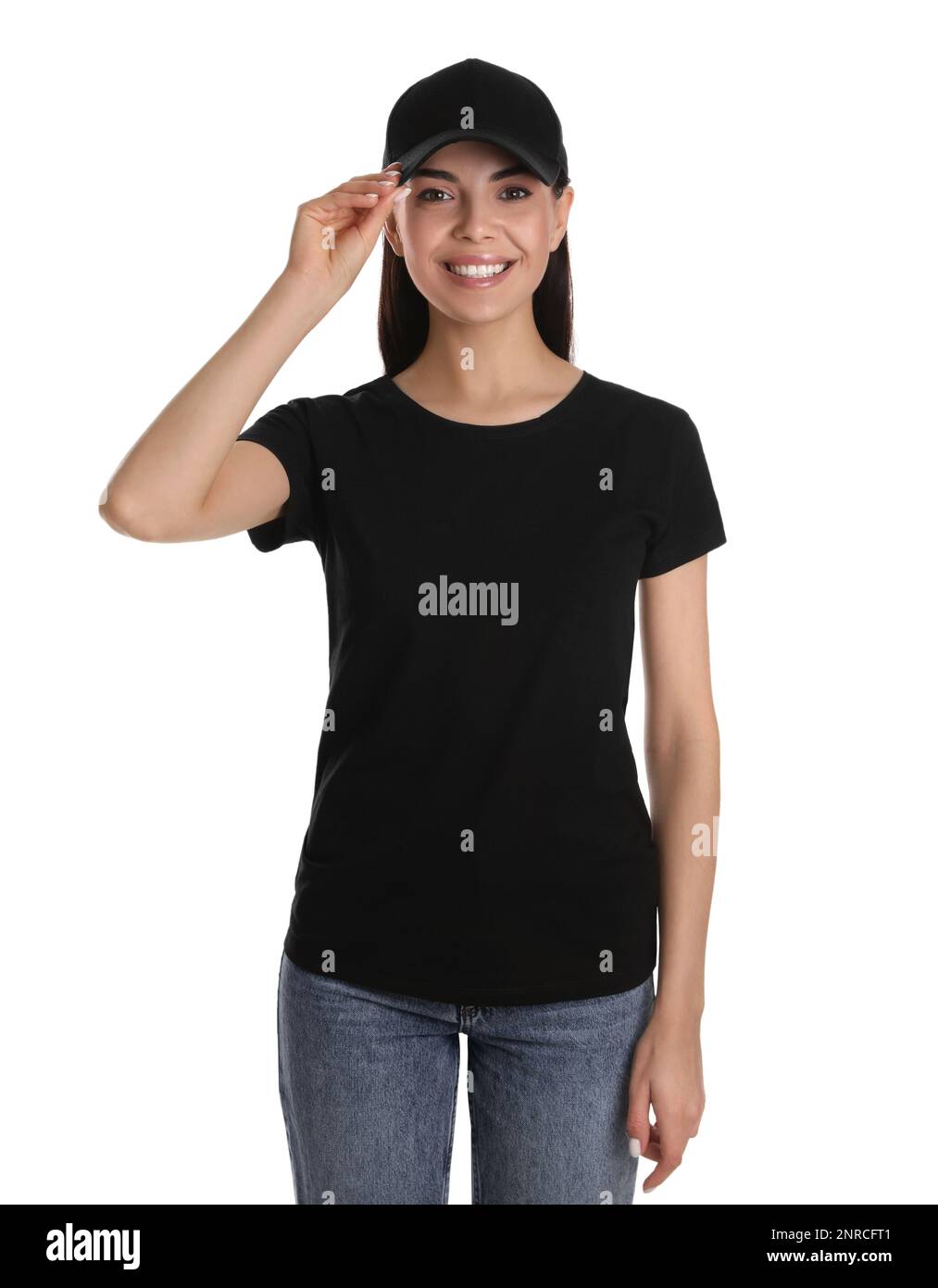 Young happy woman in black cap and tshirt on white background. Mockup ...