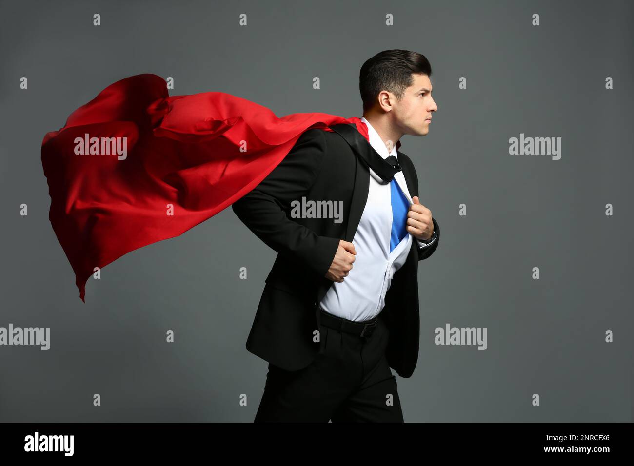 Superhero pose suit hi-res stock photography and images - Alamy