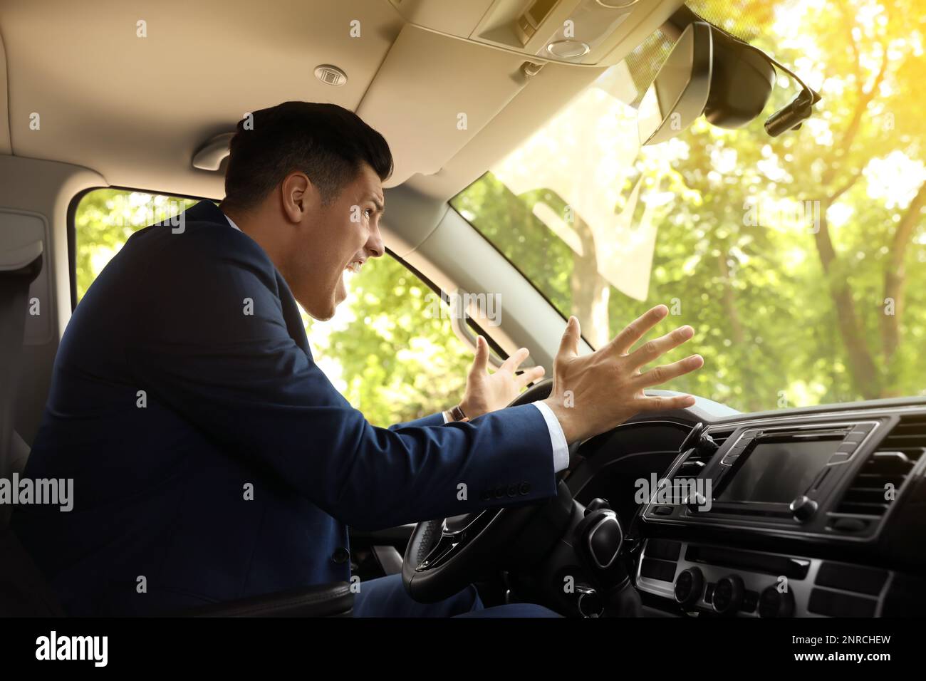 Man driving car yelling hi-res stock photography and images - Alamy