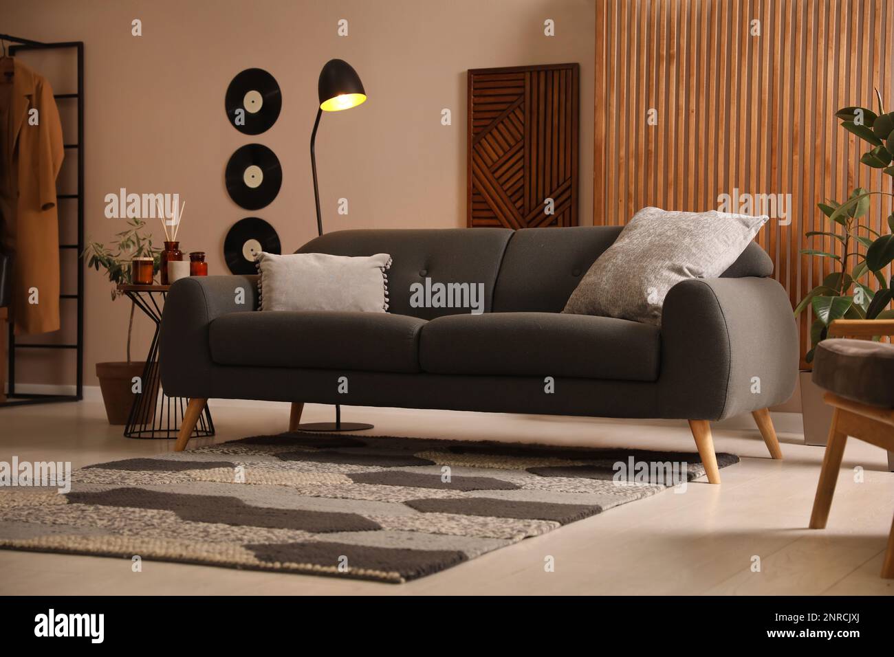 Dark sofa hi-res stock photography and images - Alamy