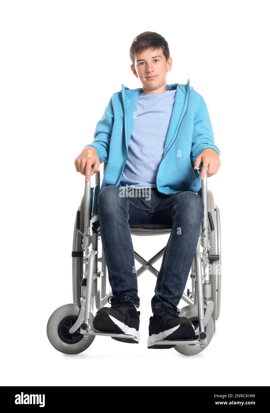Teenage boy in wheelchair on white background Stock Photo - Alamy