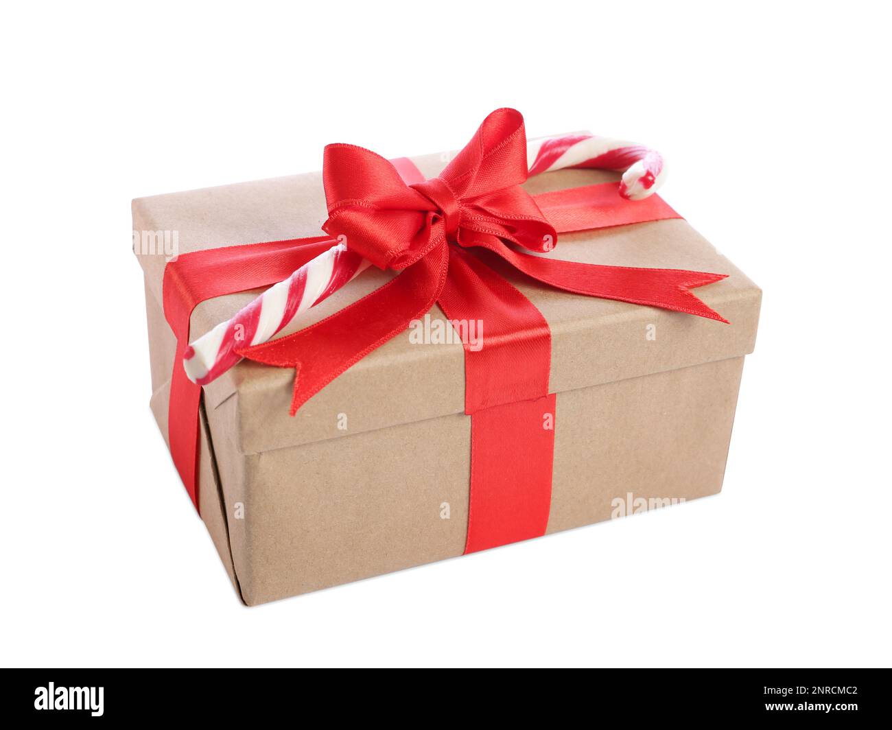 Christmas gift box decorated with red bow and candy cane on white ...