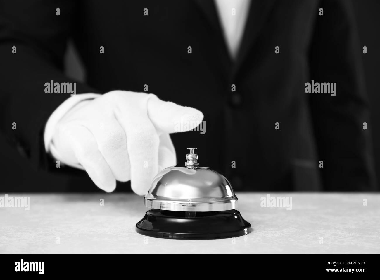 Hotel staff customer desk Black and White Stock Photos & Images - Alamy