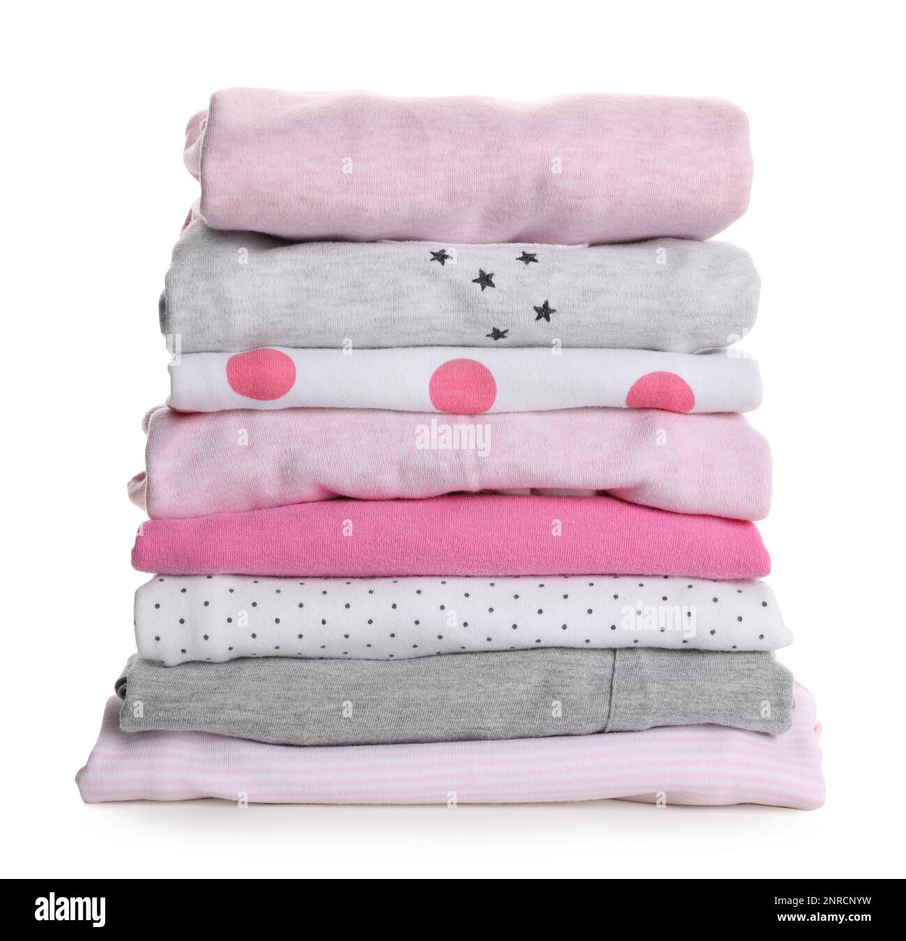 Stack of clean girl's clothes on white background Stock Photo - Alamy