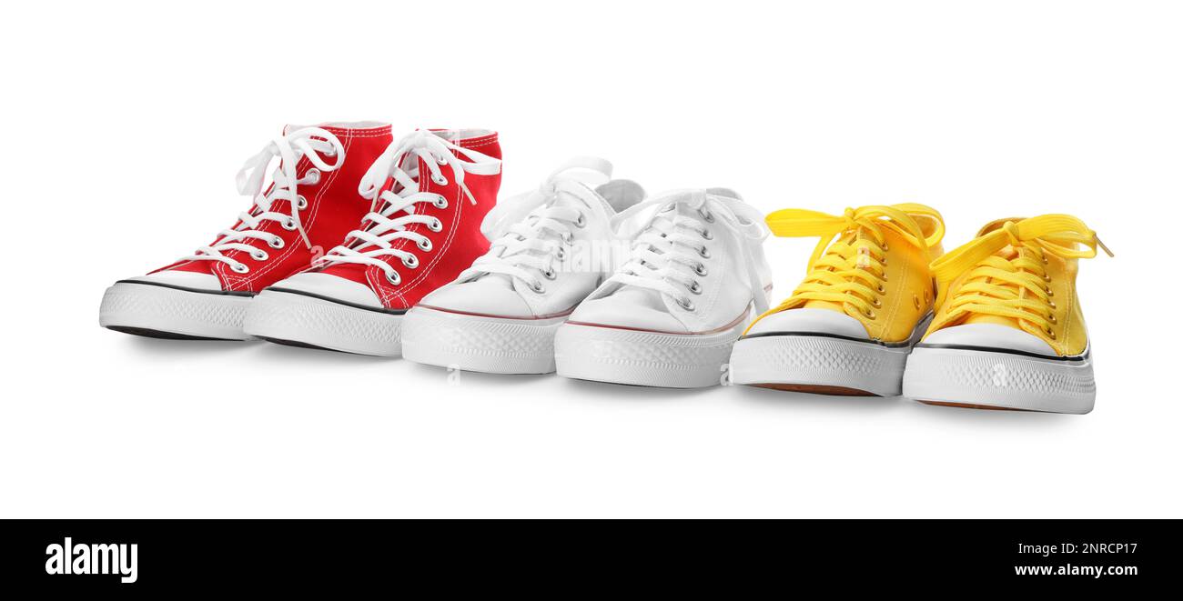 Many different sneakers on white background. Trendy shoes Stock Photo ...