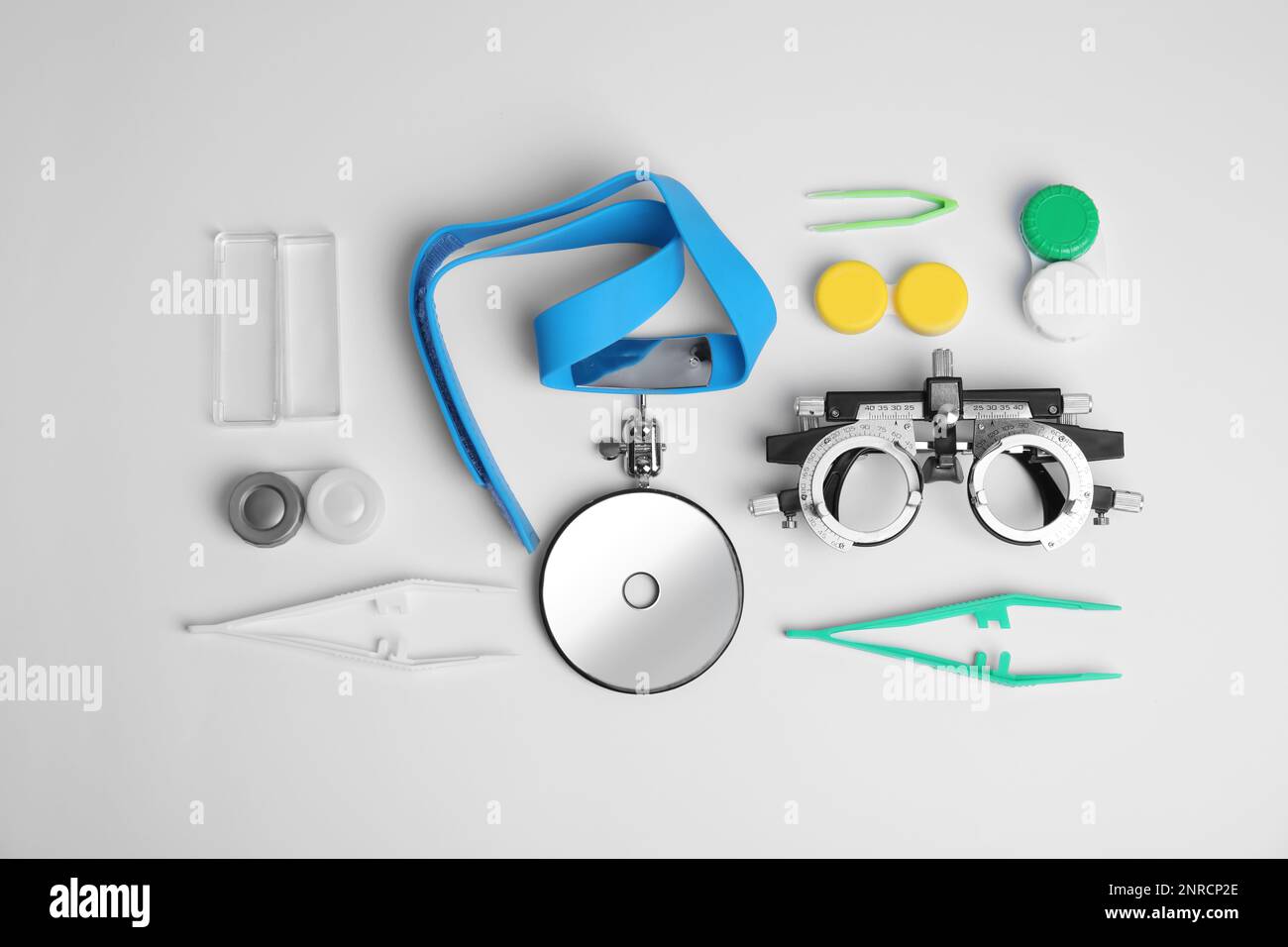 Different ophthalmologist tools on white background, flat lay Stock ...