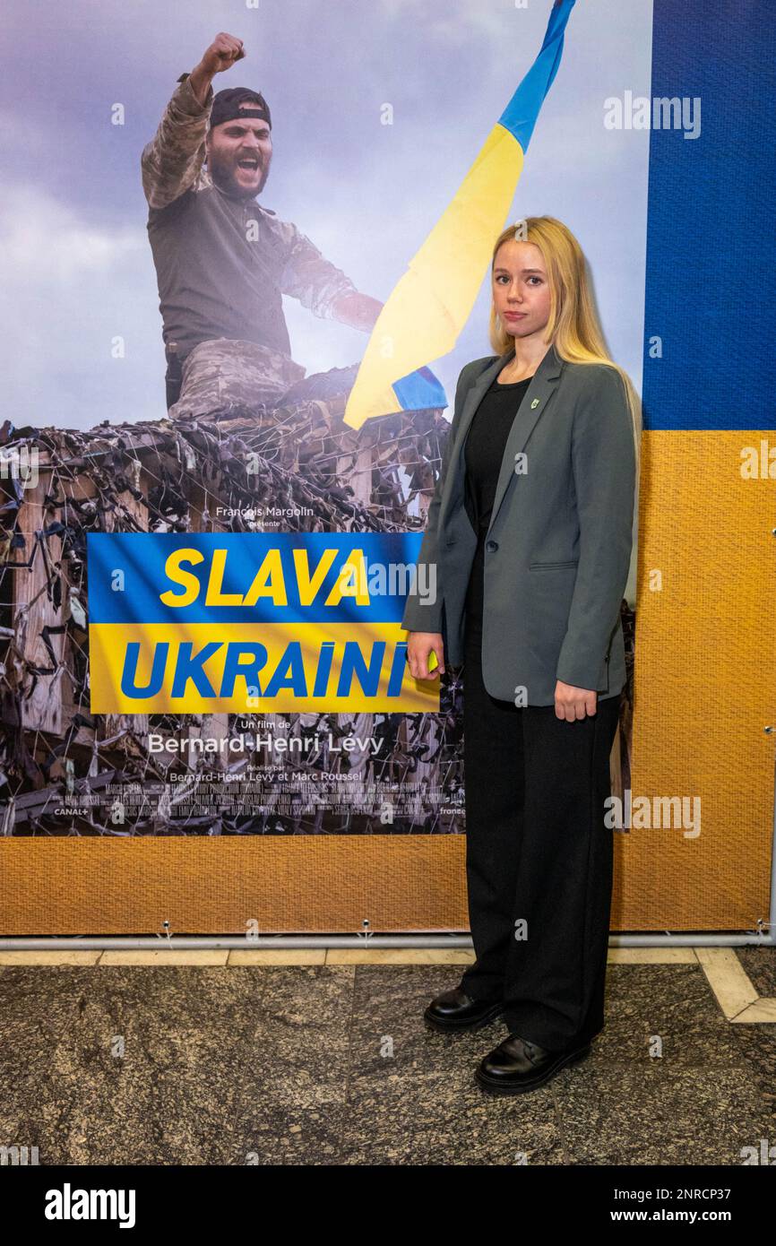 Kateryna Prokopenko, wife of Ukrainian office Denys Prokopenko poses with the poster of the ...