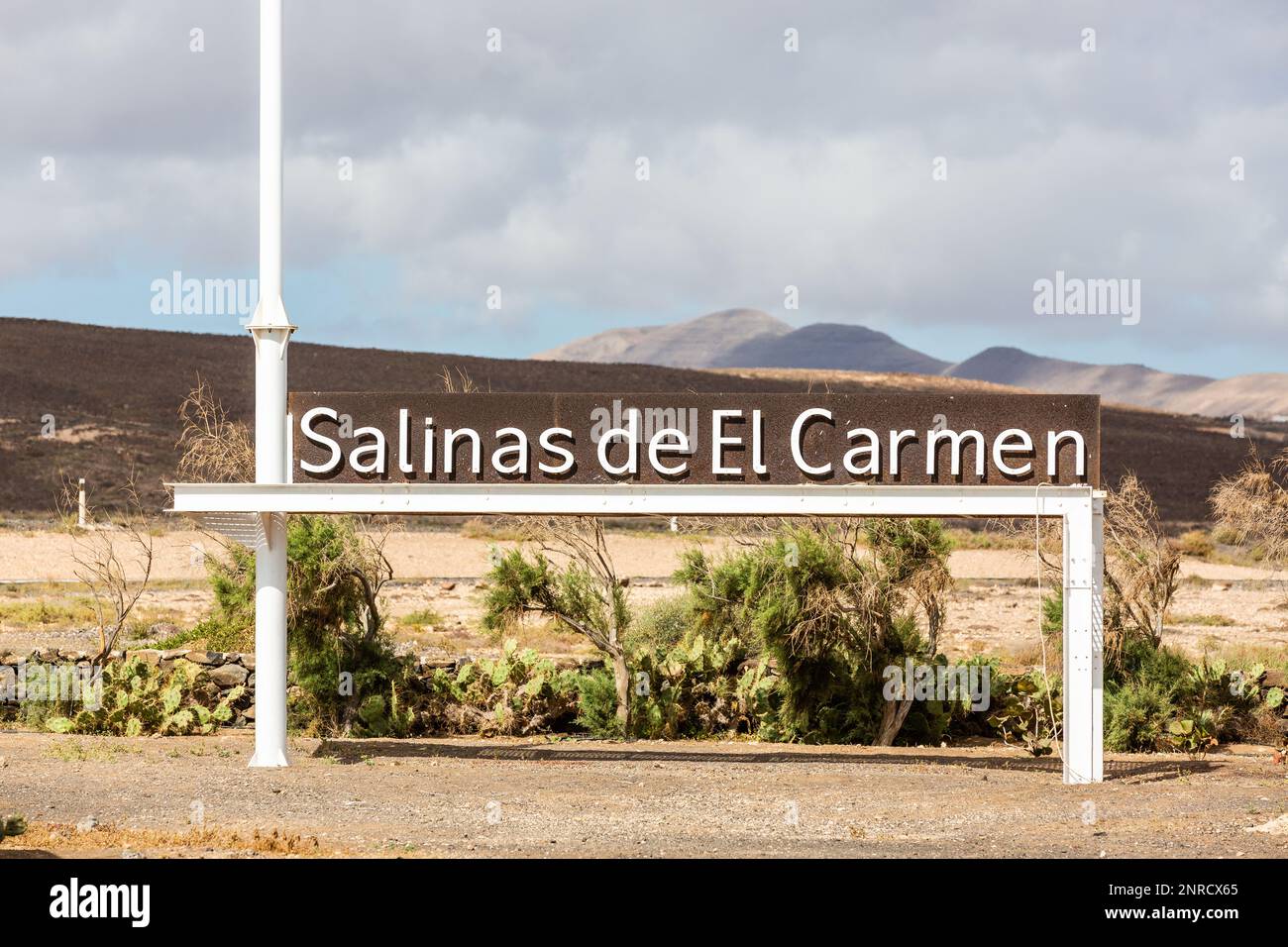 Sign mounted on the parking lot of the saltworks of El Carmen ...