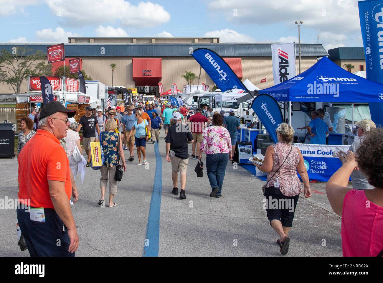 Patrons walk around displays at the 2020 Florida RV Supershow on ...