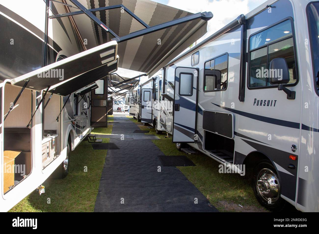 Campers on display inviting patrons to step inside and explore at the ...