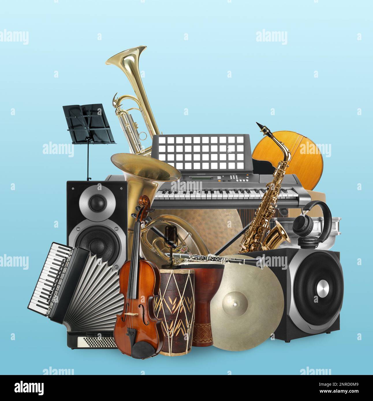 Group of different musical instruments on light blue background Stock ...