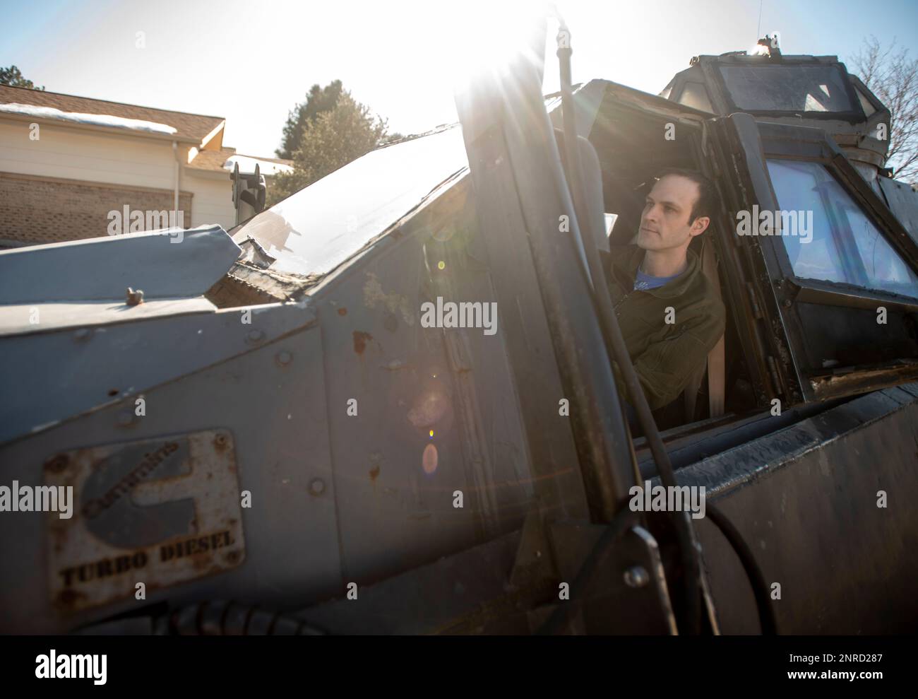 Storm chaser Ryan Shepard poses for a portrait outside his home in ...