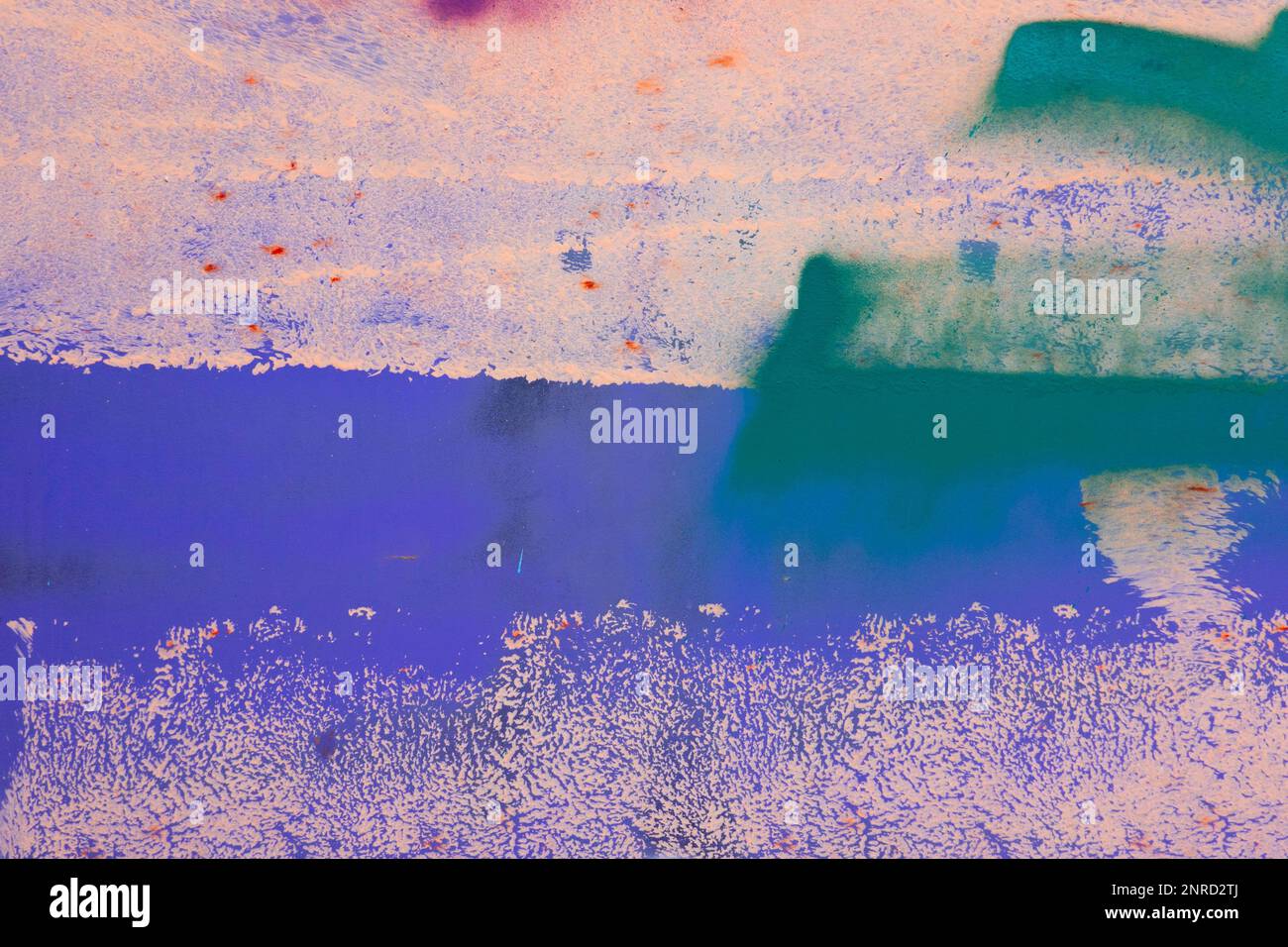 Messy paint strokes and smudges on an old painted wall background ...