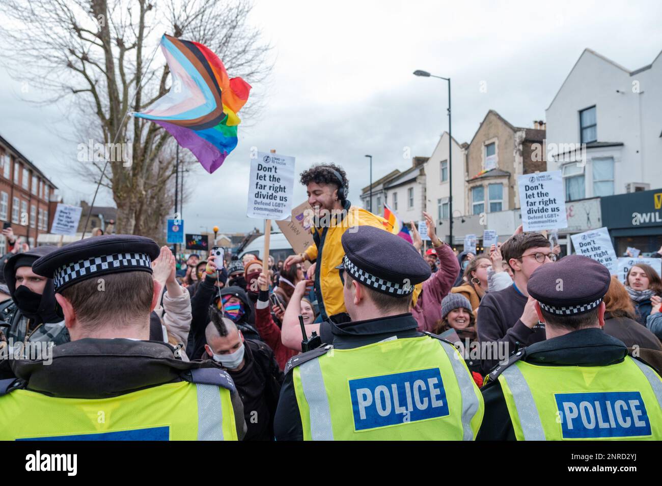 Pro-LGBT counter-protesters protect and surround Honor Oak Pub and push ...