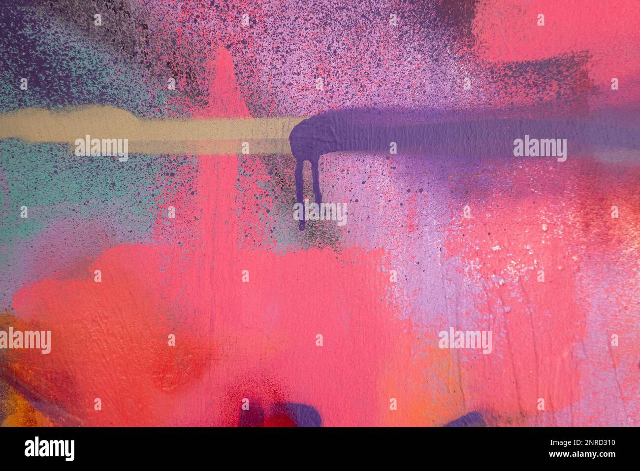 Messy paint strokes and smudges on an old painted wall with graffiti ...