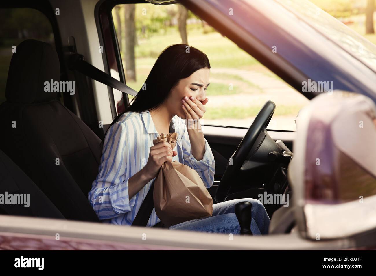 Puke bag hi-res stock photography and images - Alamy