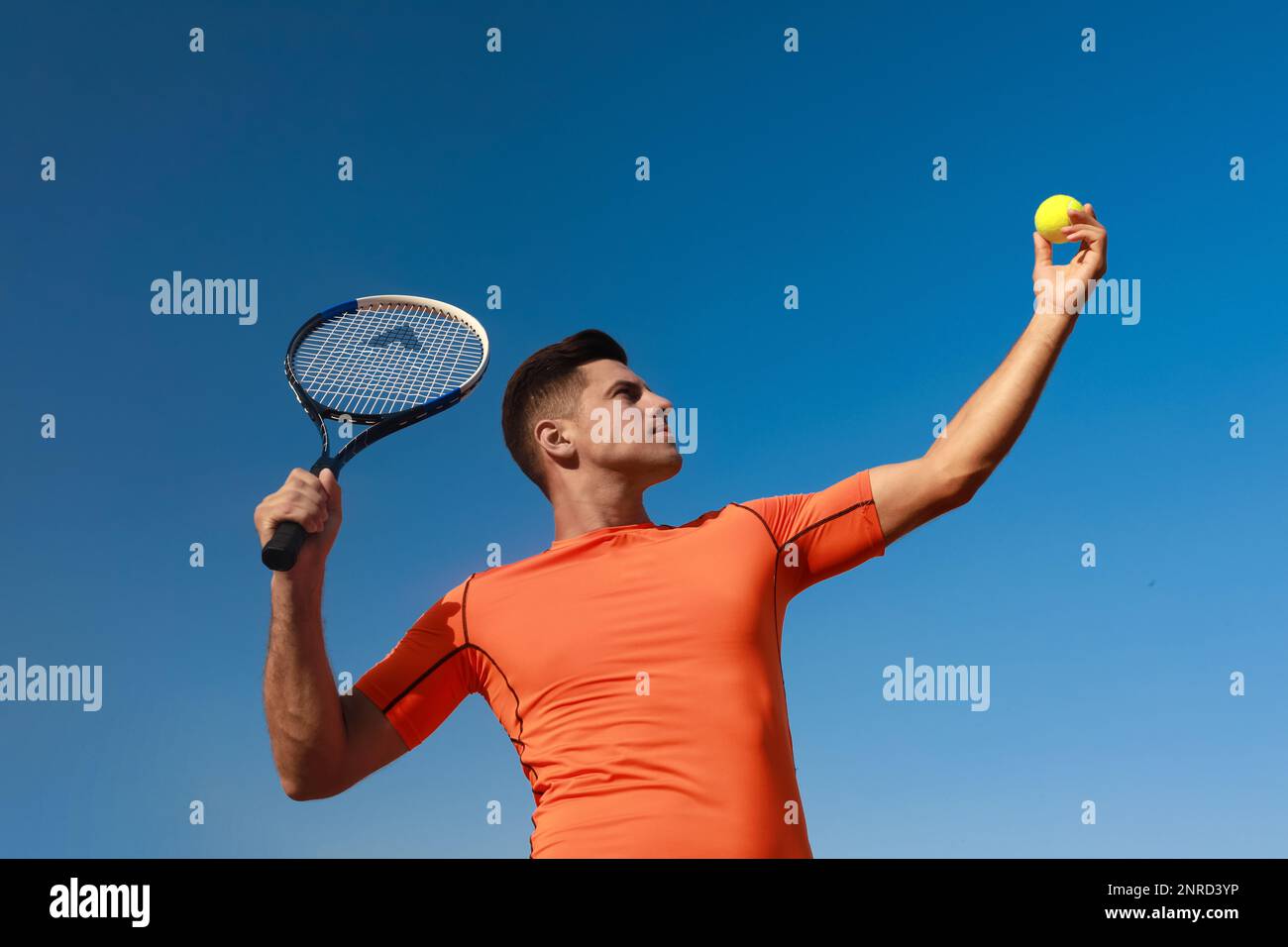 Man playing blue tennis court hi-res stock photography and images - Alamy