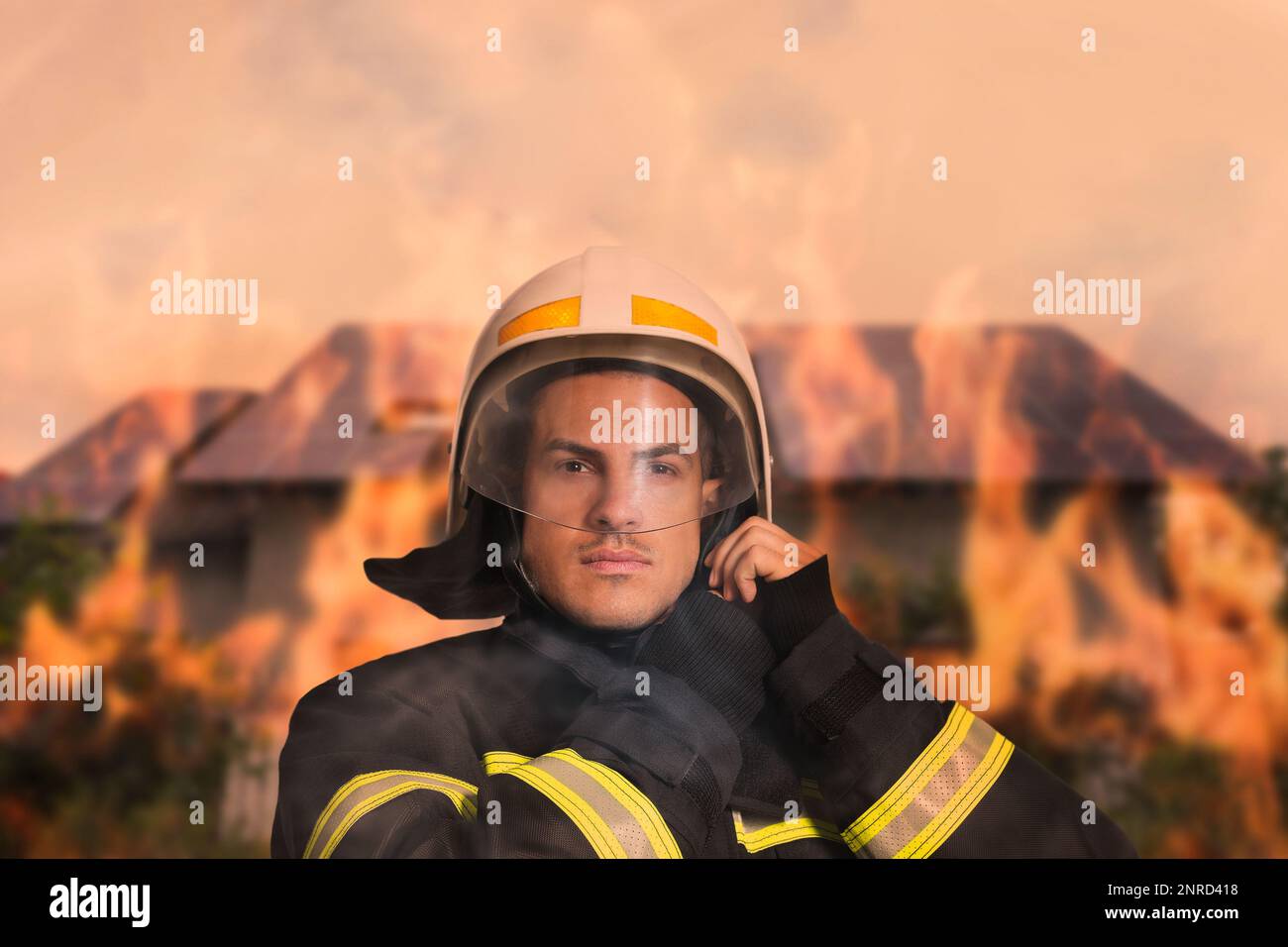 Rescuer wearing uniform and helmet. Professional firefighter Stock ...