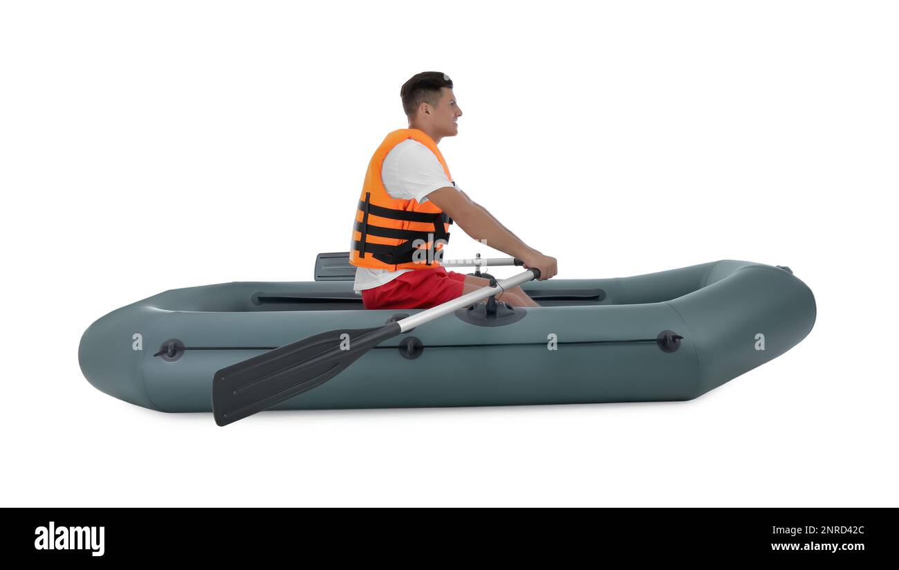 Man in life vest rowing inflatable rubber boat on white background ...