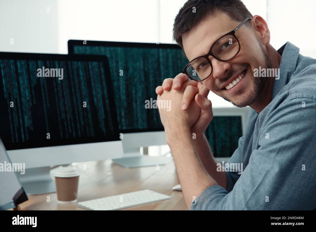 Happy programmer hi-res stock photography and images - Alamy