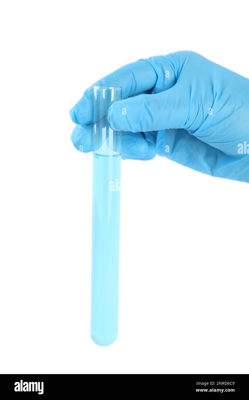 Scientist holding test tube with liquid on white background, closeup ...