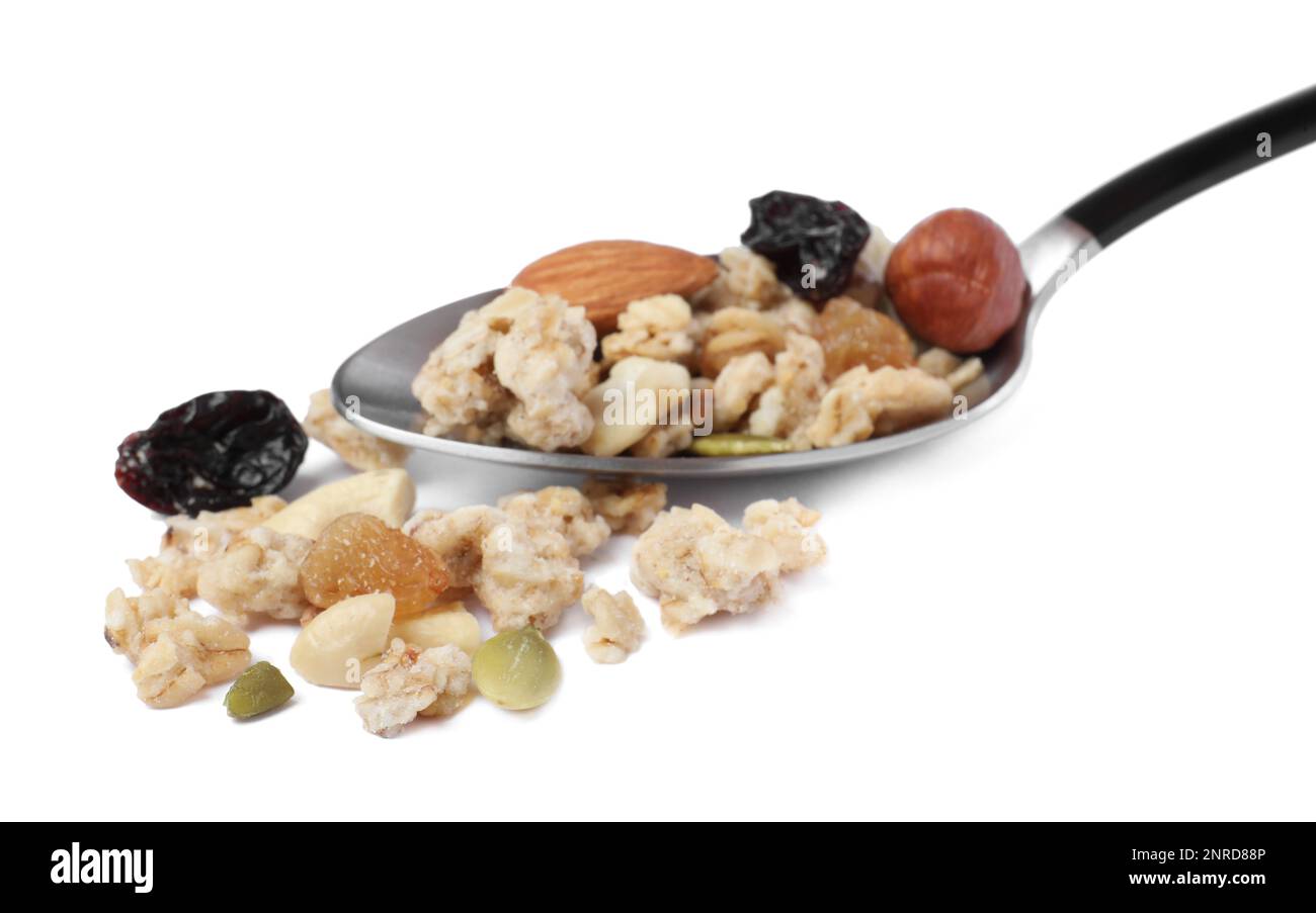 Spoon with granola on white background. Healthy snack Stock Photo - Alamy