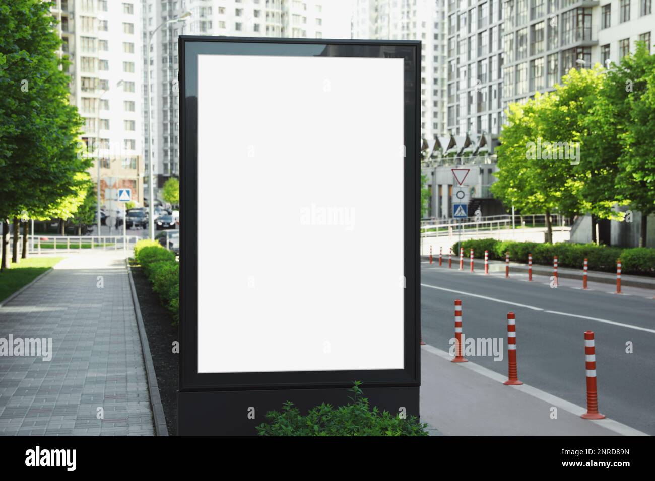 Blank advertising board on city street. Mockup for design Stock Photo ...