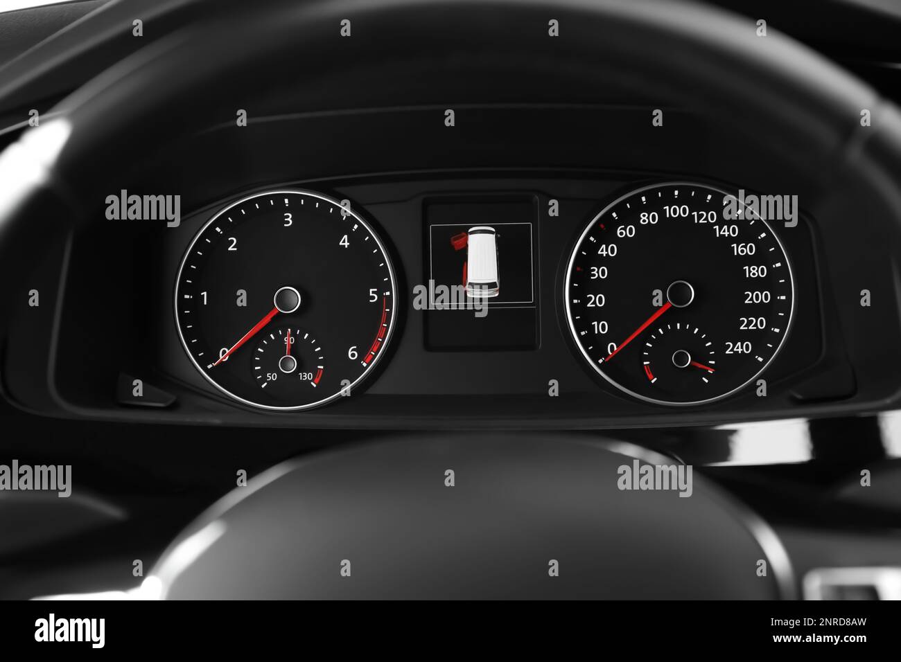 Modern speedometer, tachometer and open door warning sign on car ...