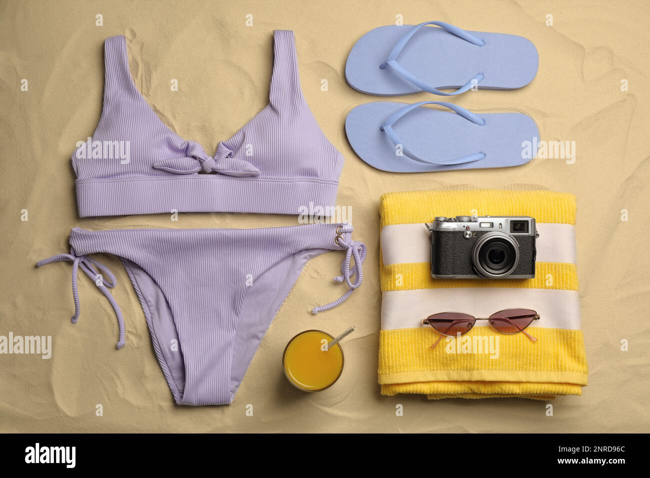 Flat lay composition with beach objects on sand Stock Photo - Alamy
