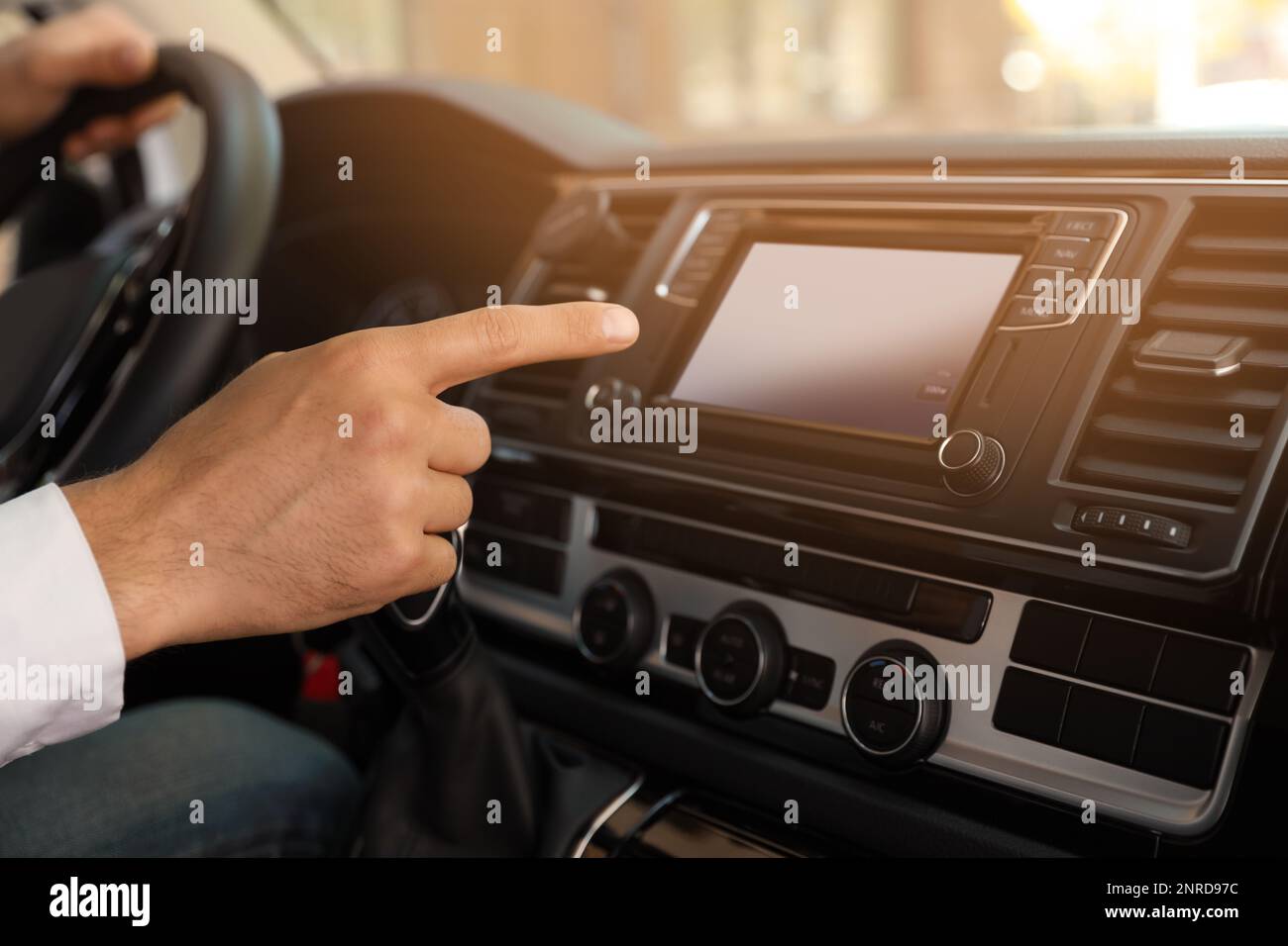 Man using navigation system while driving car, closeup Stock Photo - Alamy