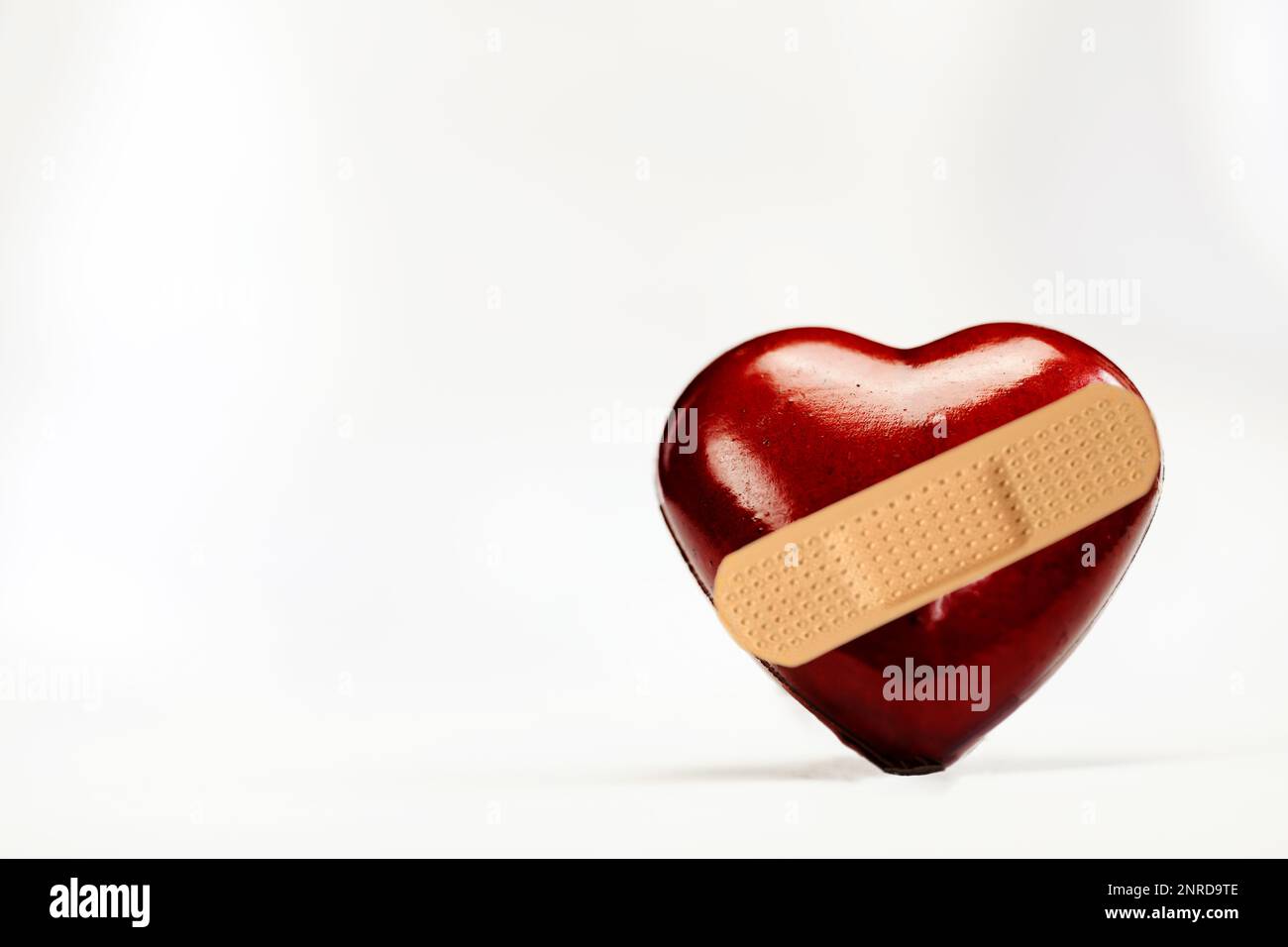 Fixed broken heart isolated on hi-res stock photography and images - Alamy