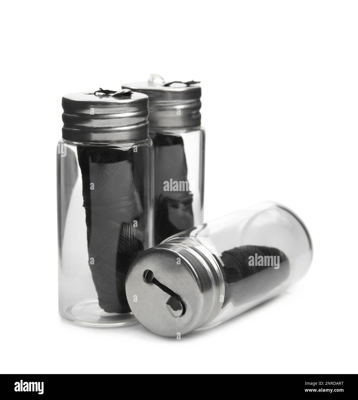 Rolls of natural organic dental floss in jars on white background Stock ...