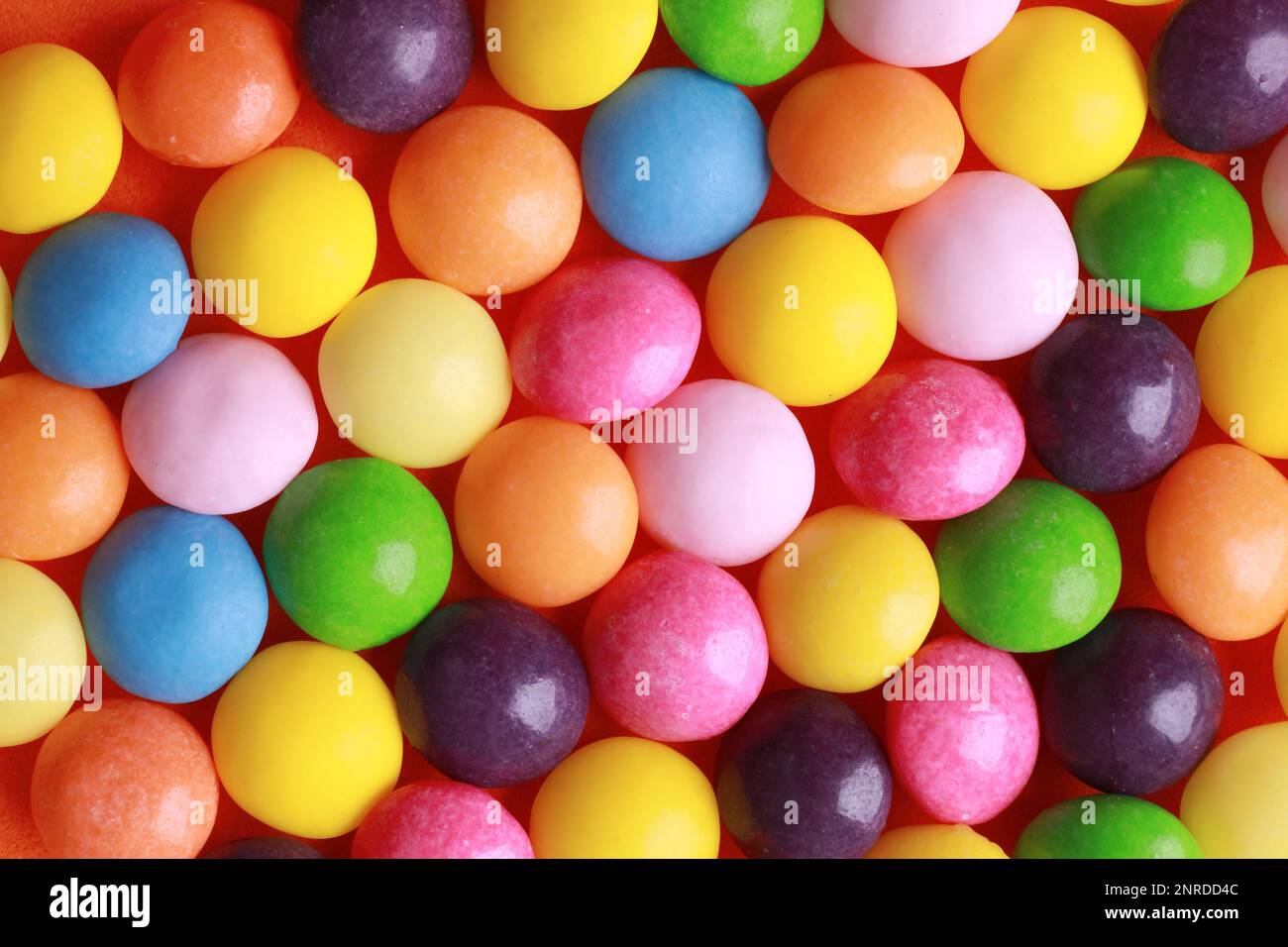 Many delicious colorful dragee candies, above view Stock Photo - Alamy