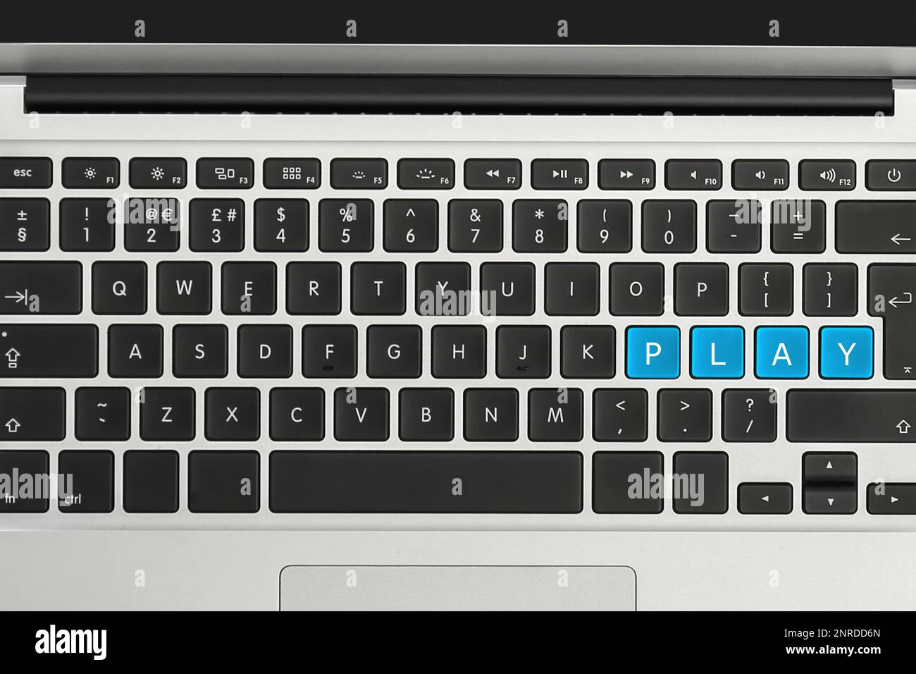 Blue buttons with letters P L A Y on laptop keyboard, top view Stock ...