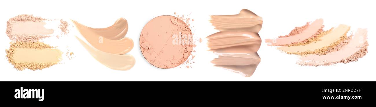 Set with different liquid foundation and face powder on white ...