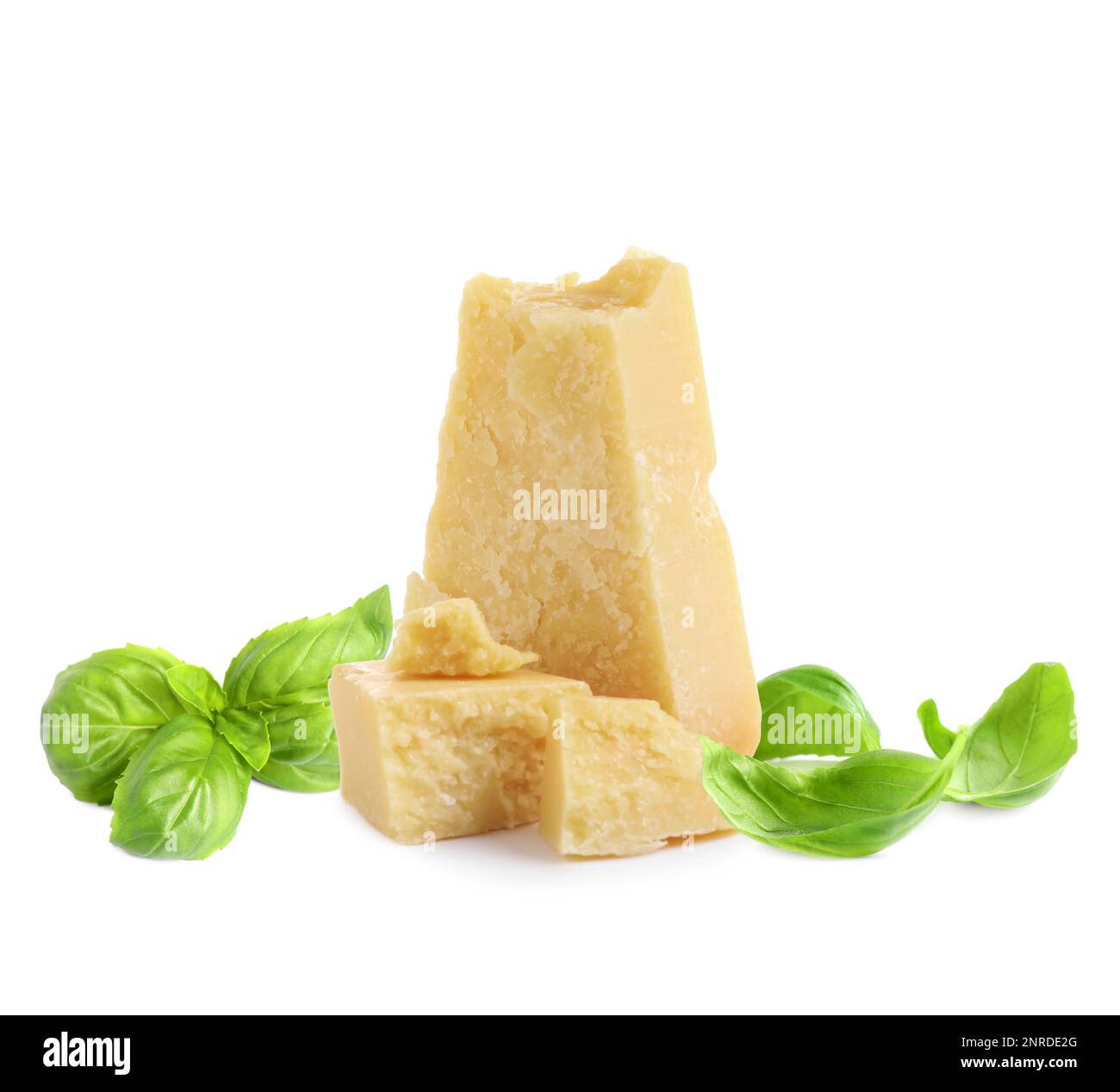 Delicious parmesan cheese and basil on white background Stock Photo - Alamy
