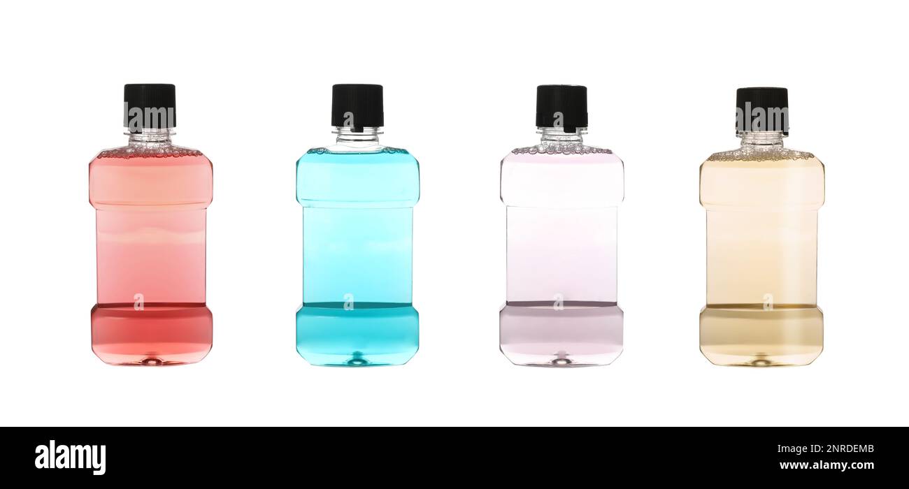 Set of bottles with mouthwash for teeth care on white background ...