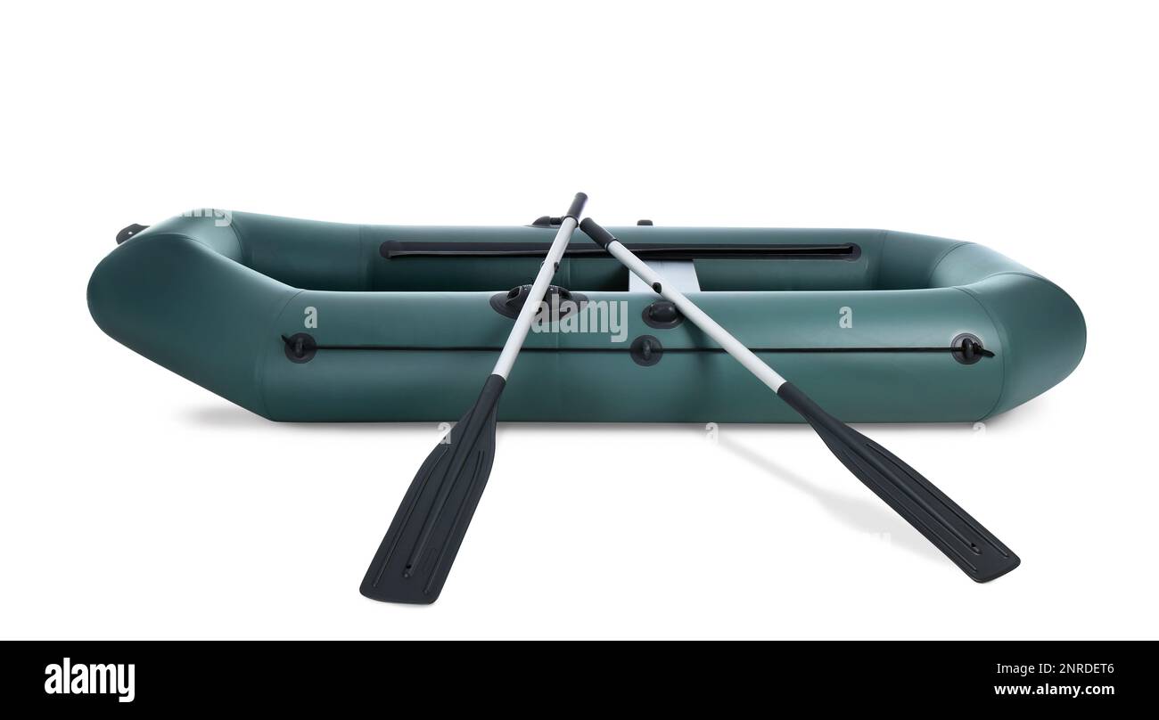 Inflatable rubber fishing boat with aluminium oars and seat isolated on ...