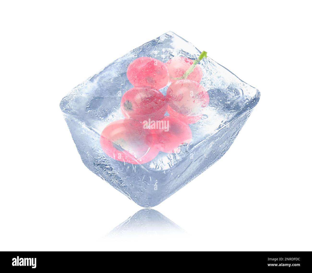 Delicious red currants frozen in ice isolated on white Stock Photo - Alamy