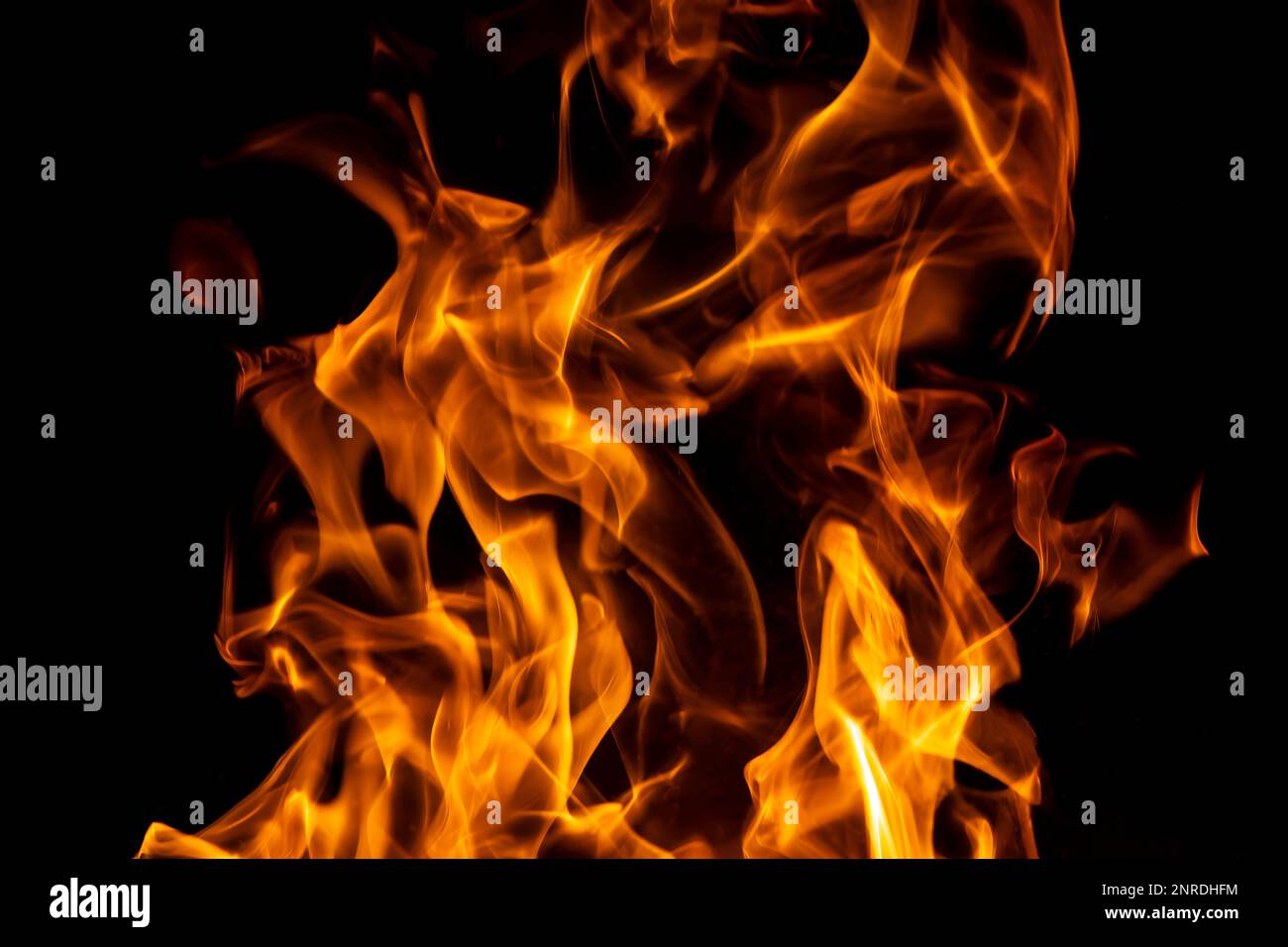 A fire in the dark with some flames Stock Photo - Alamy