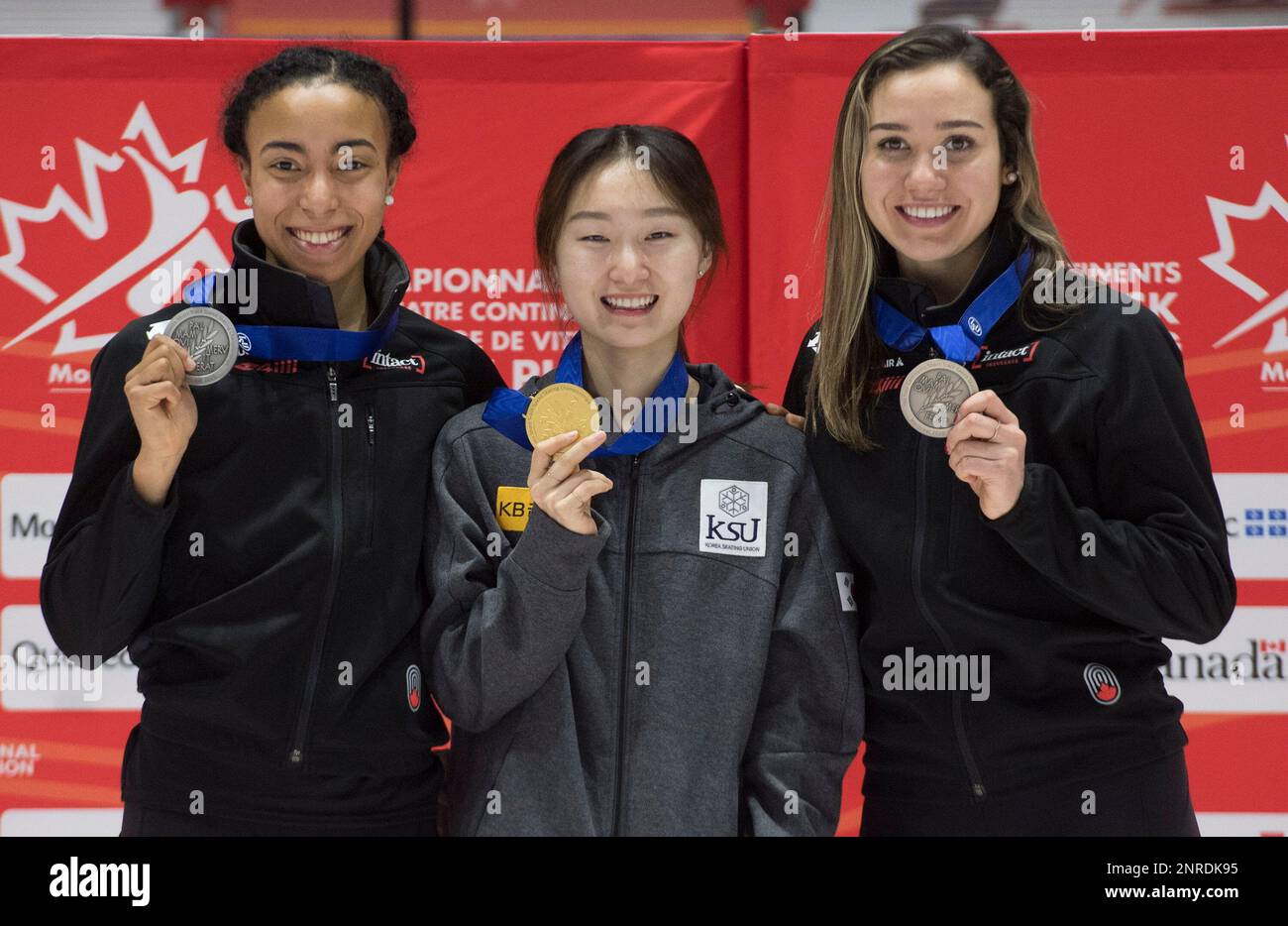 From left, Alyson Charles, of Canada, Choi Min Jeong, of South Korea ...