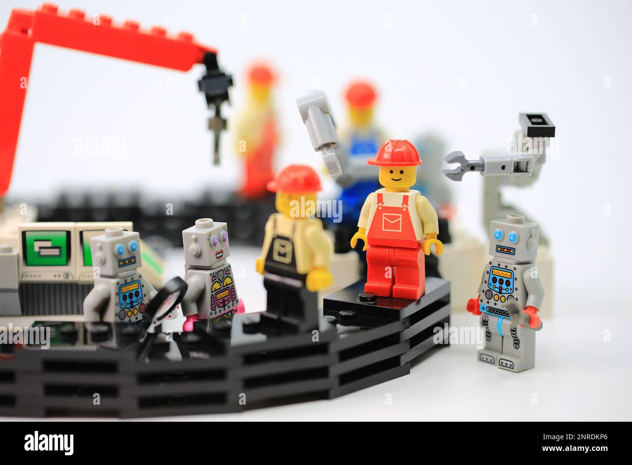 machine make the human or human make a machine Stock Photo - Alamy