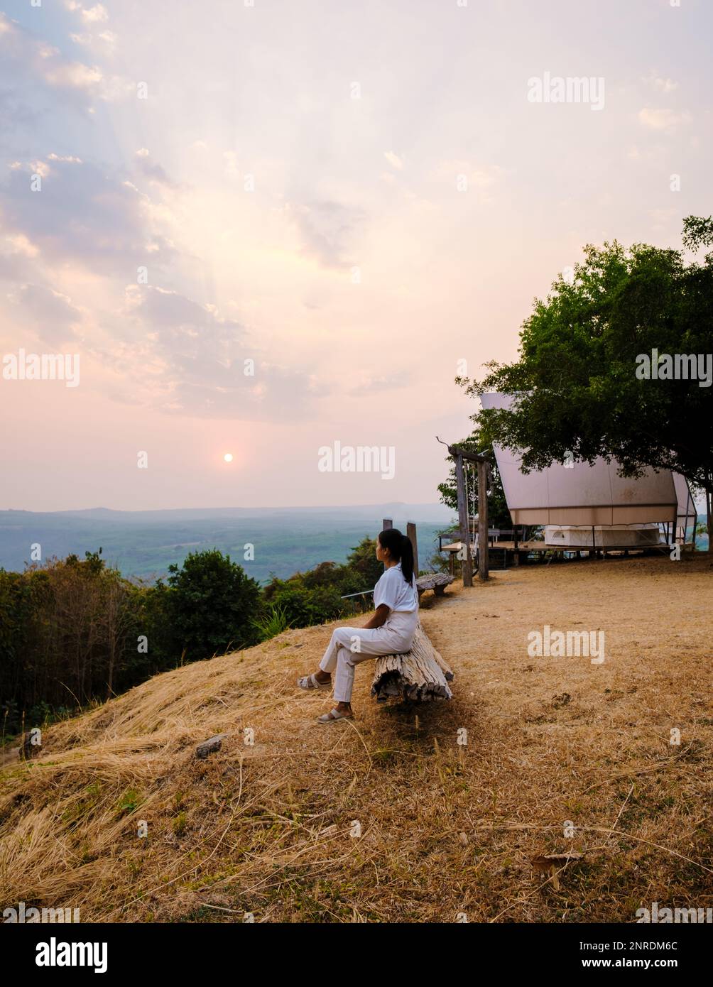 Sunset at a mountain camping in Phitsanulok Thailand. luxury glamping ...