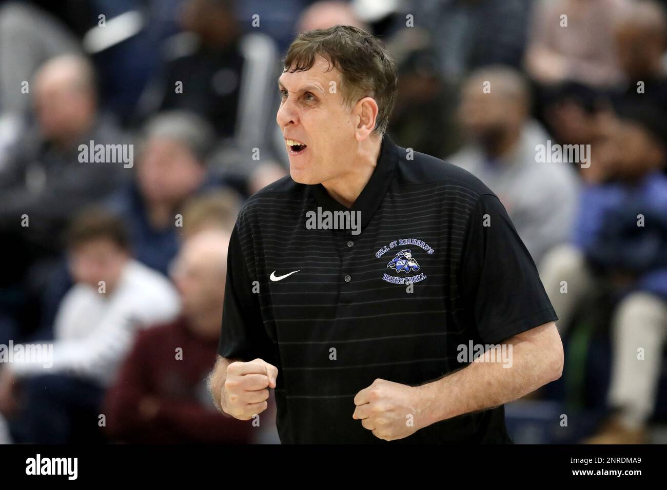 Gill St. Bernard's head coach Mergin Sina is seen on the sidelines ...
